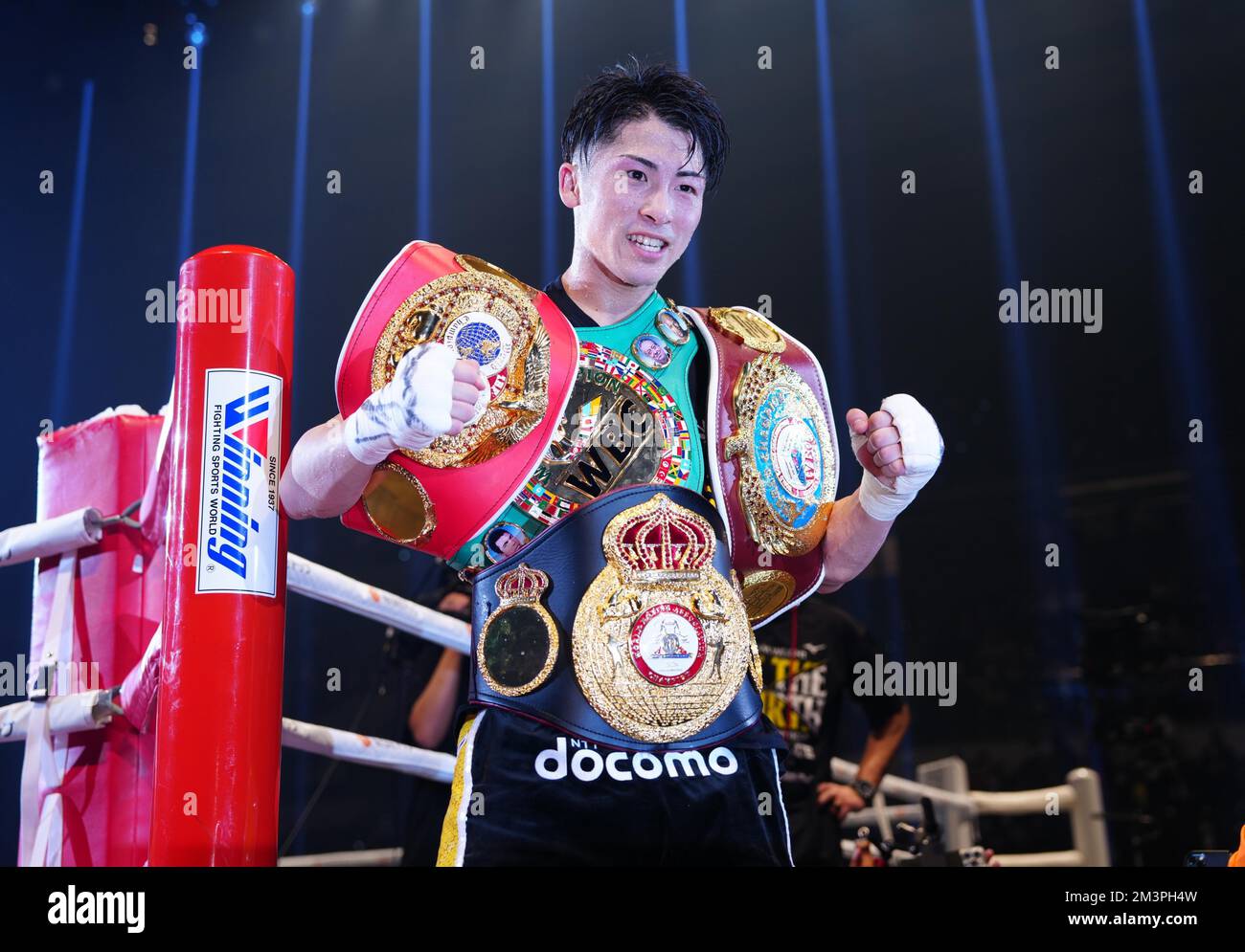 Japan's Naoya Inoue poses with his four champion belts after defeating ...