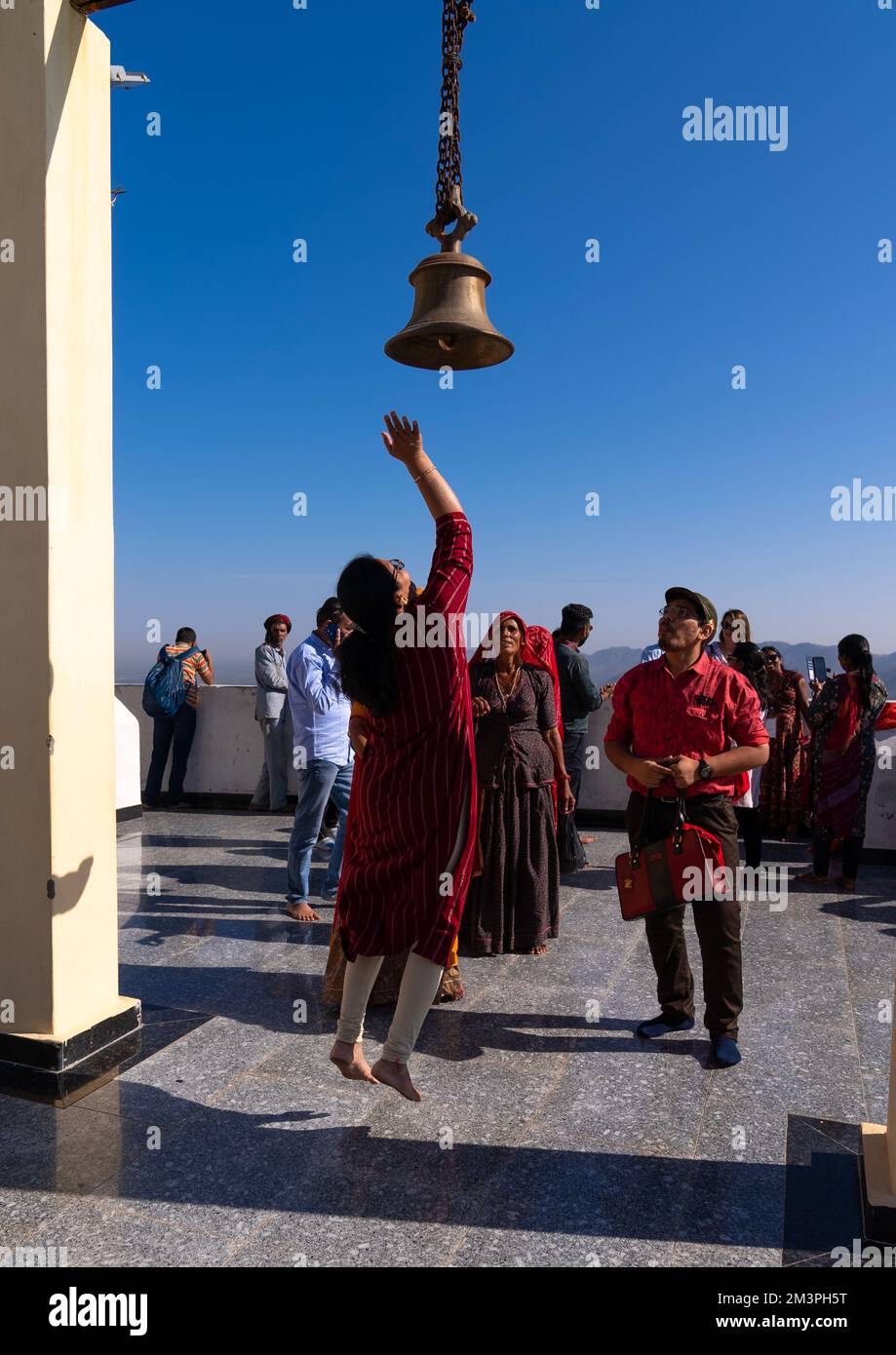 Indian people ringing bell in Savitri Temple, Rajasthan, Pushkar, India ...