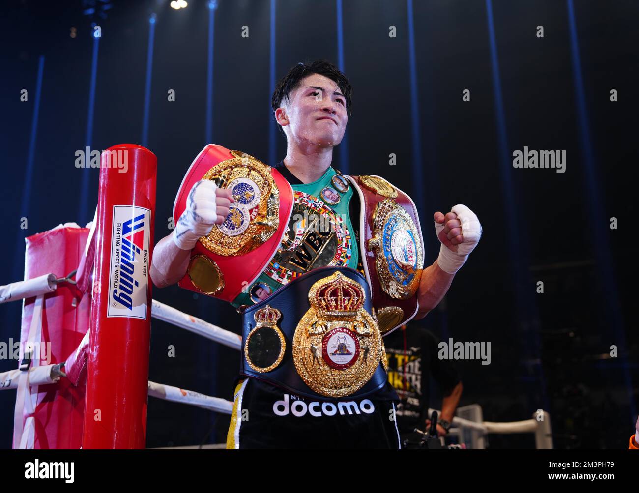 Japan's Naoya Inoue poses with his four champion belts after defeating ...