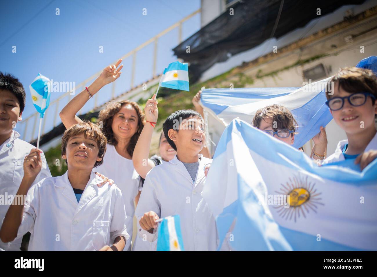 Buenos Aires, Argentina. 15th Dec, 2022. Teachers and students sing and ...