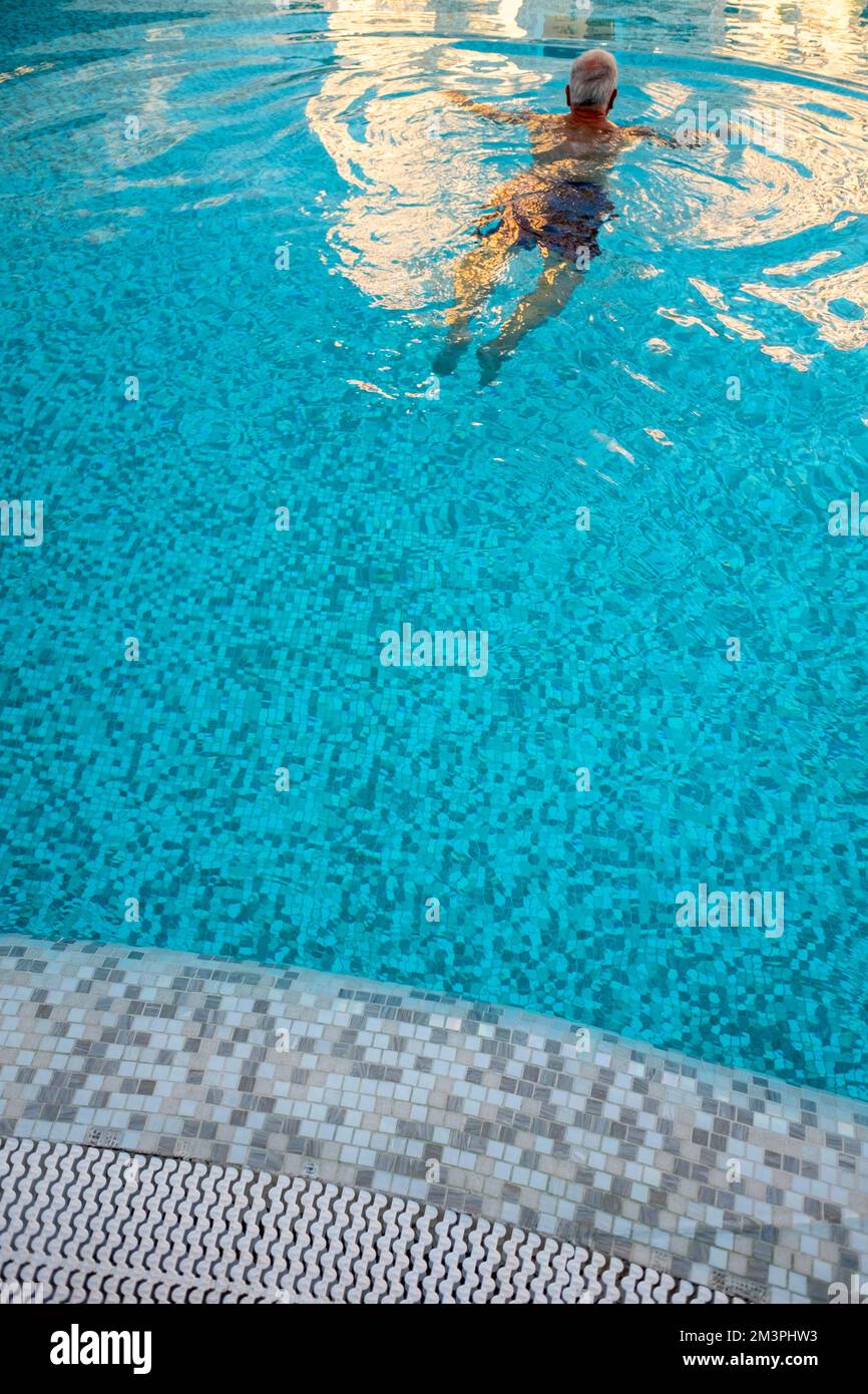 Bald man swimming hi-res stock photography and images - Alamy