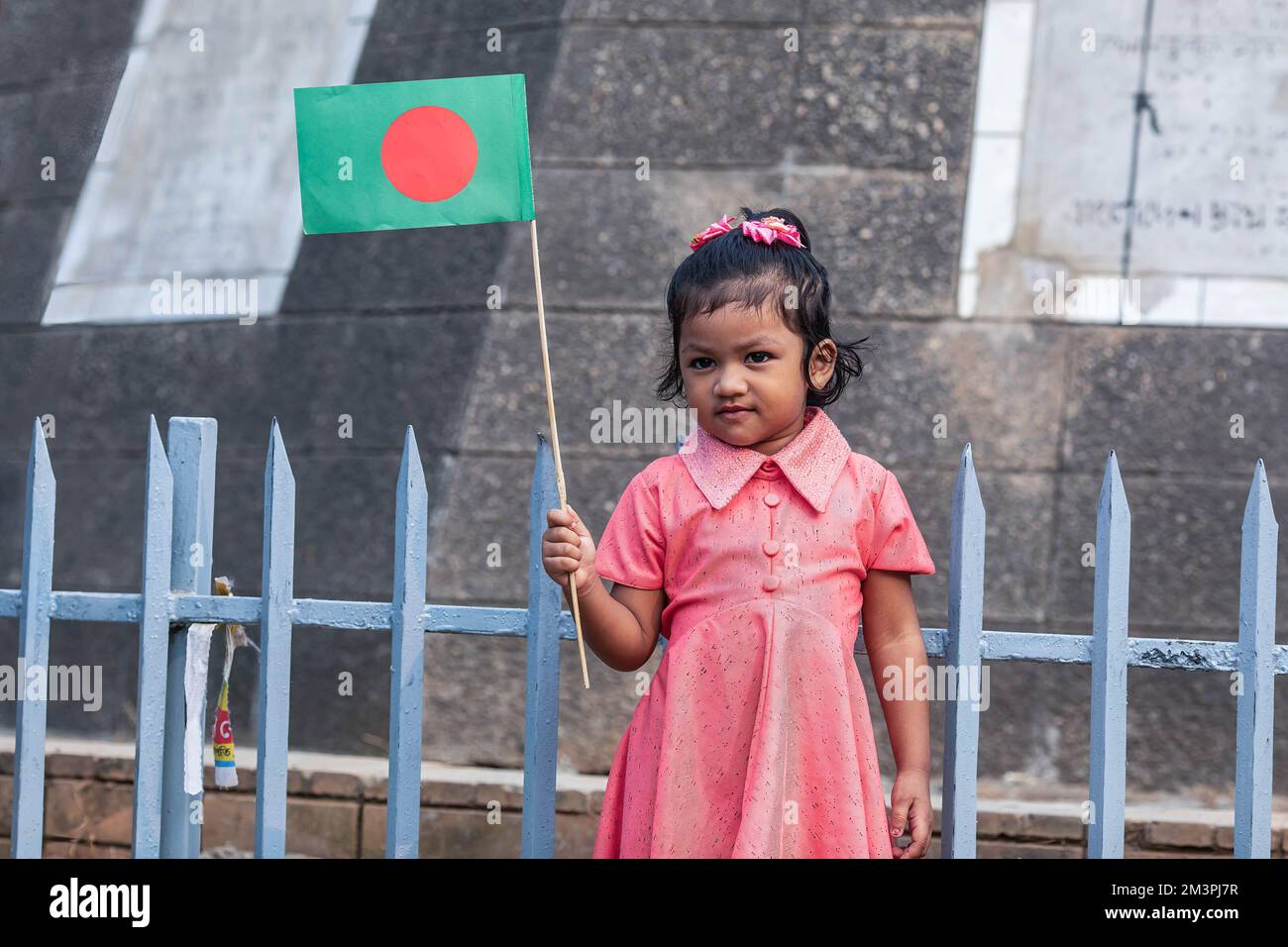 Dhaka, Bangladesh. 16th Dec, 2022. A kid holds the Bangladesh National ...