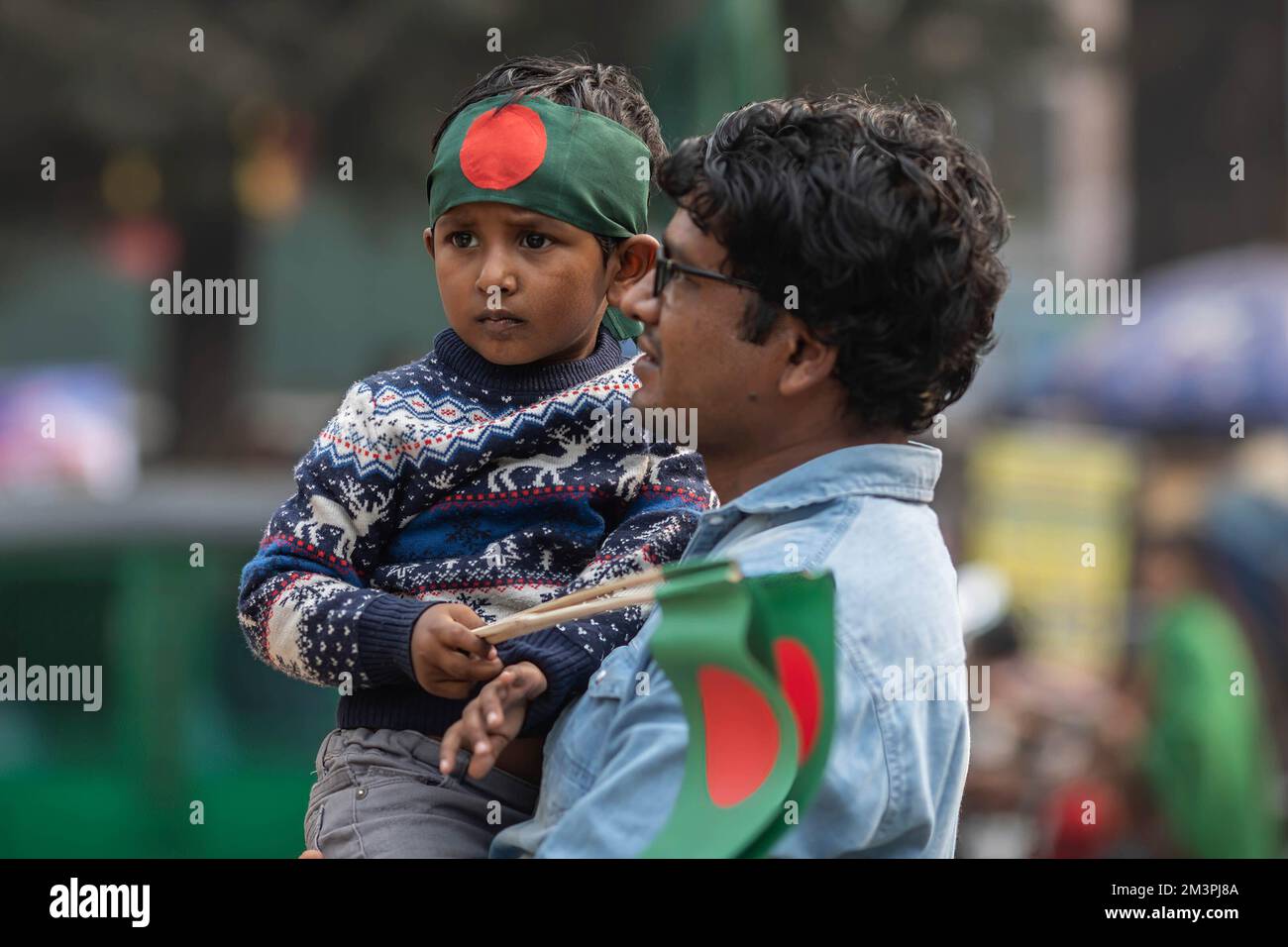 Dhaka, Bangladesh. 16th Dec, 2022. A kid holds the Bangladesh National ...