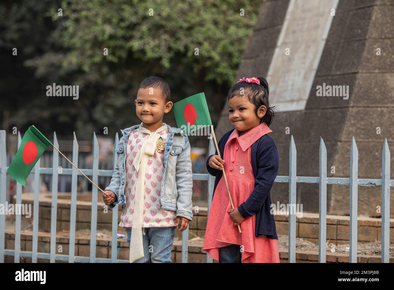Dhaka, Bangladesh. 16th Dec, 2022. Kids hold the Bangladesh National ...