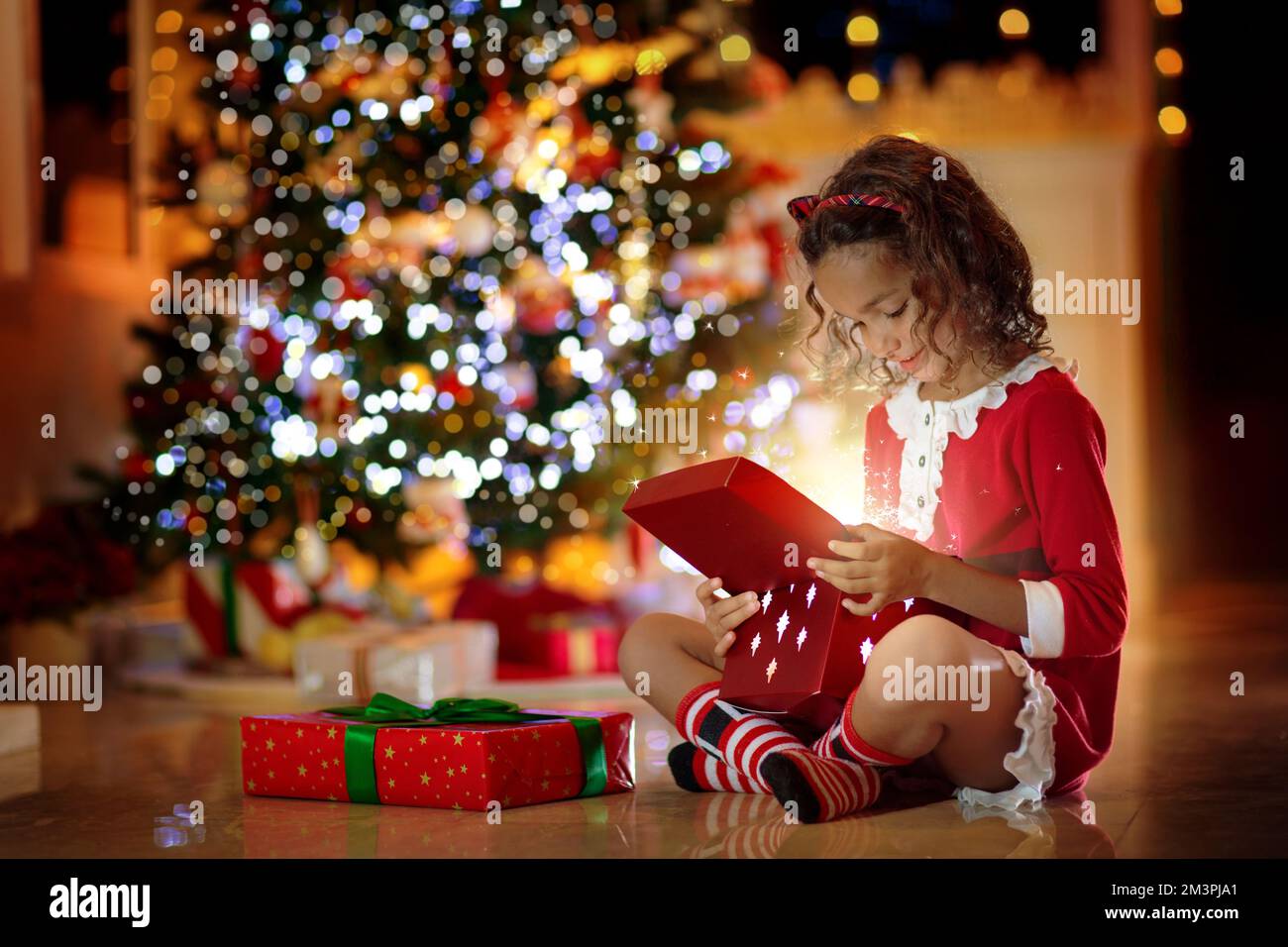 Child opening magic gift box hi-res stock photography and images - Alamy