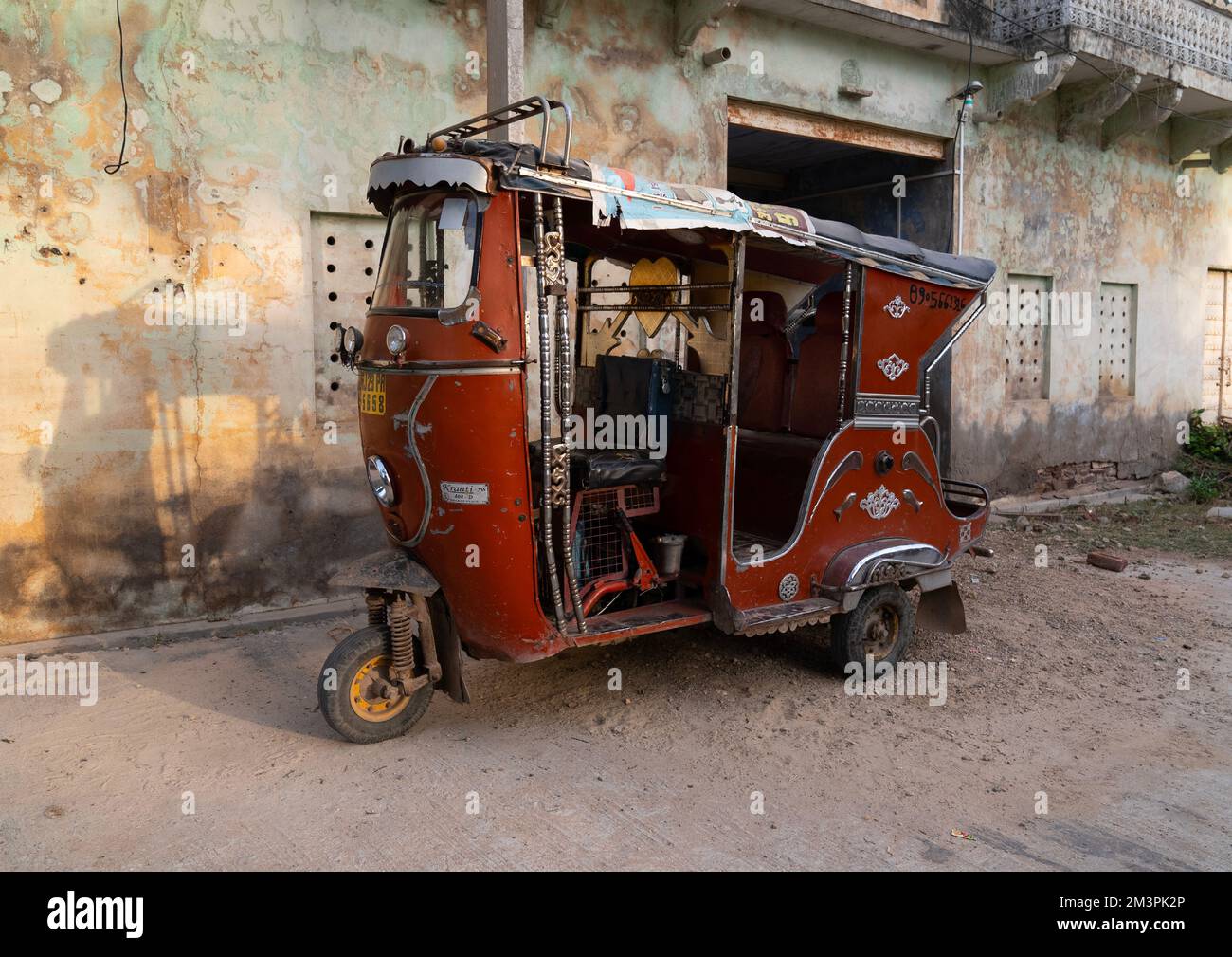 Red rickshaw in the street, Rajasthan, Dundlod, India Stock Photo - Alamy