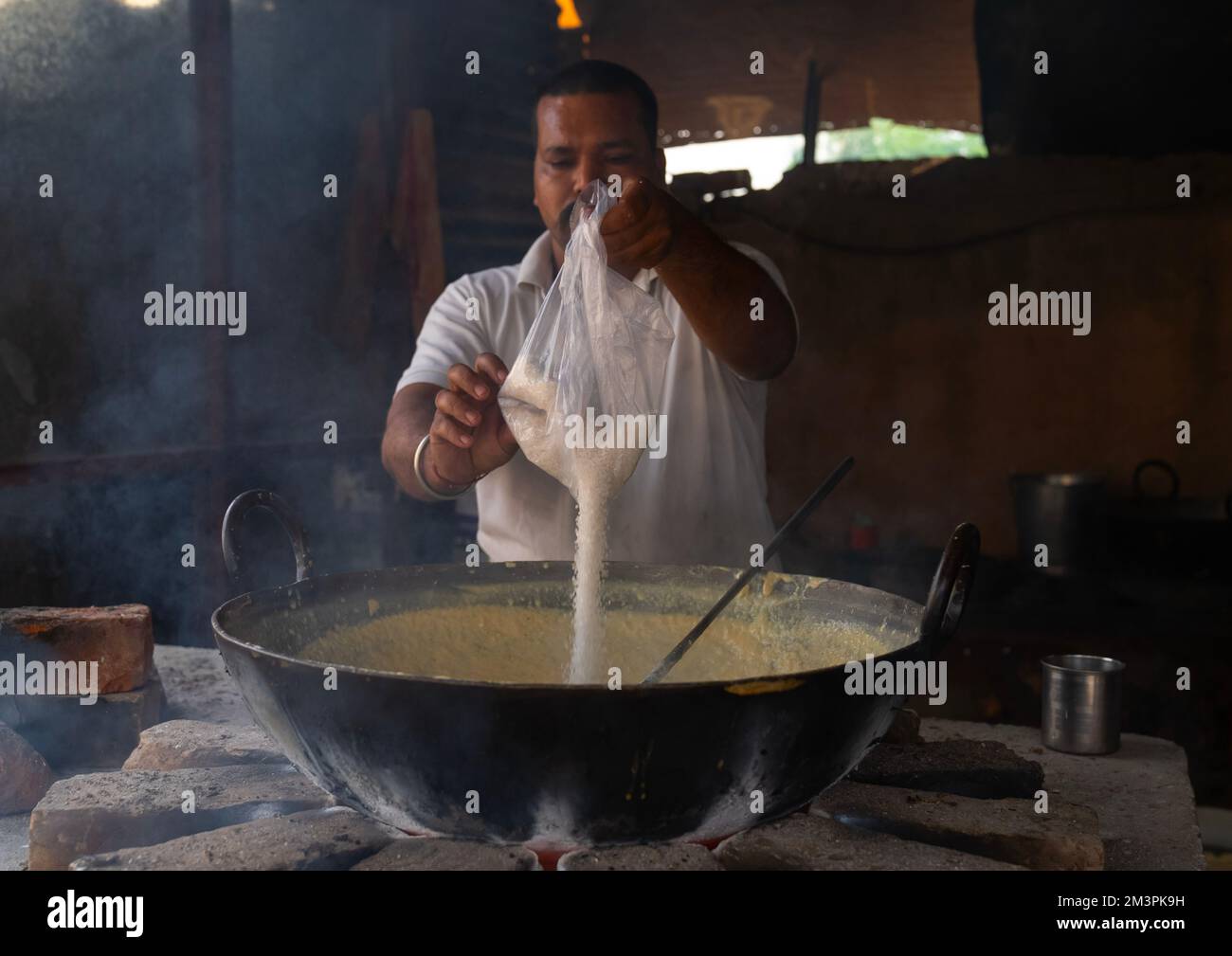 Indian man making sweets, Rajasthan, Bissau, India Stock Photo - Alamy