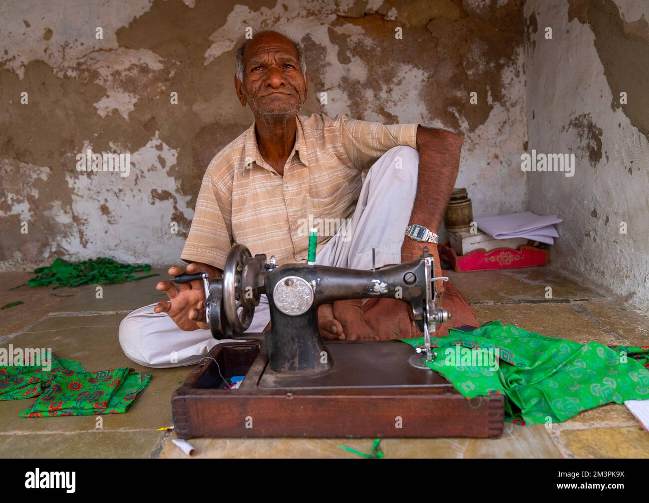 Indian tailor working in his workshop, Rajasthan, Bissau, India Stock ...