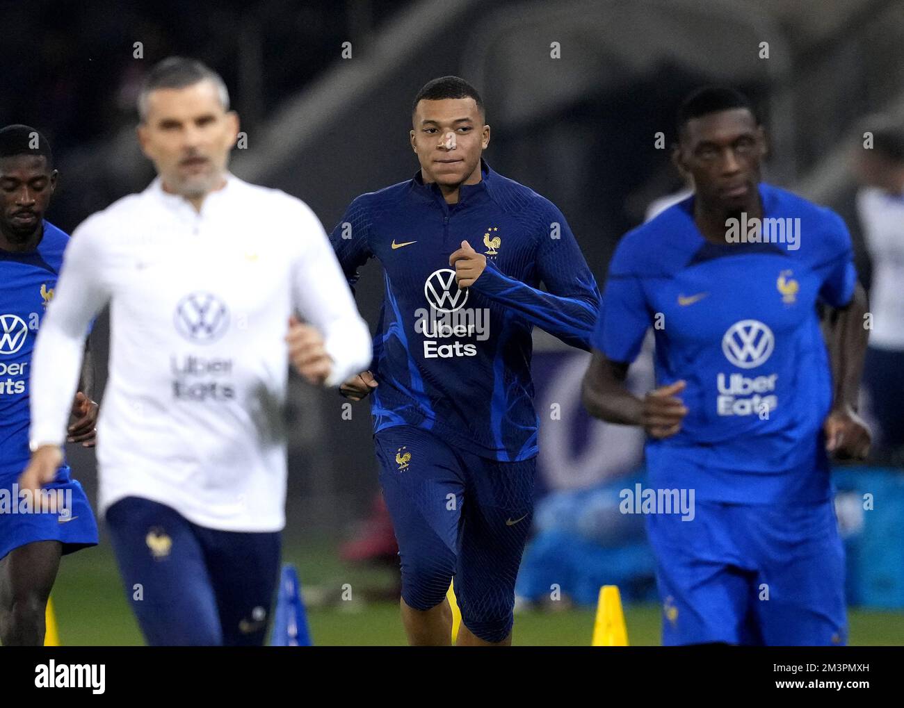 France's Kylian Mbappe (centre) during a training session at Al Sadd SC ...