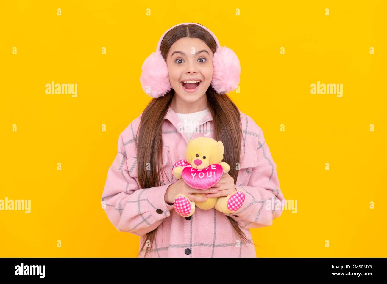 What a happy surprise. Surprised child hold teddy. Toy gift for ...