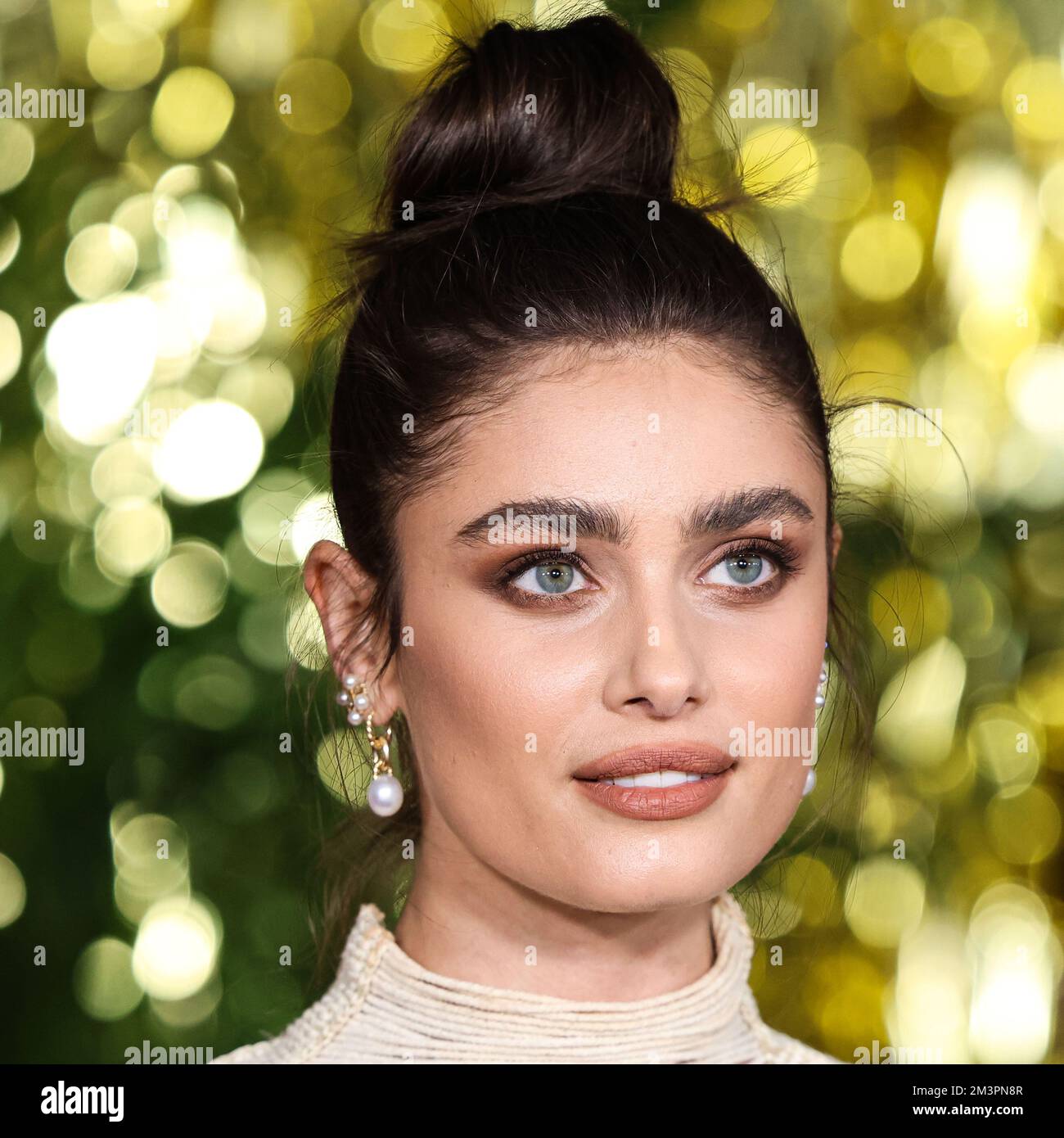 LOS ANGELES, CALIFORNIA, USA - DECEMBER 15: American model Taylor Hill arrives at the Global ...