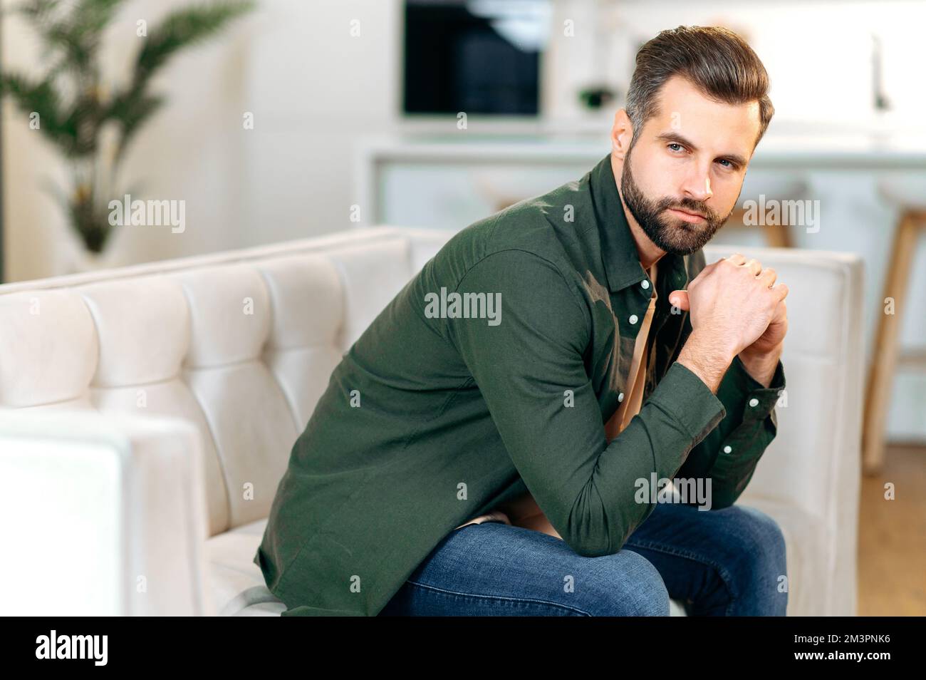Unhappy sad adult man sit hi-res stock photography and images - Alamy