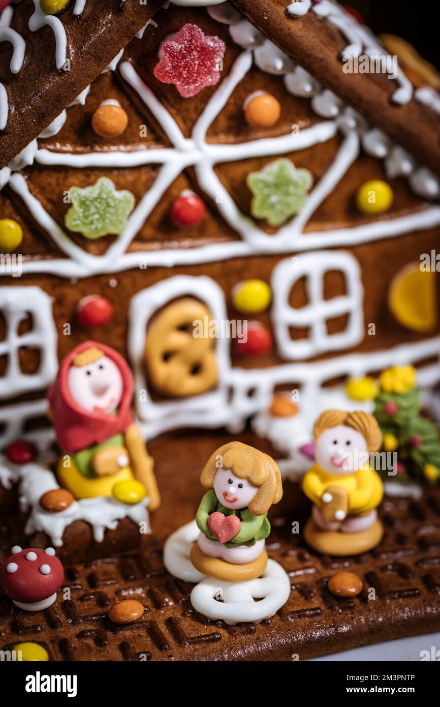 Christmas house made from gingerbread. Playfully decorated with ...