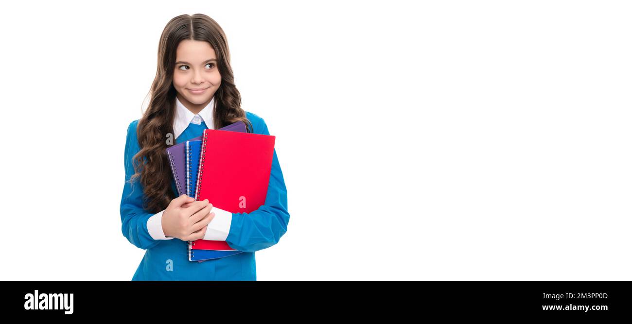 smiling kid portrait has long curly hair with school workbook isolated ...