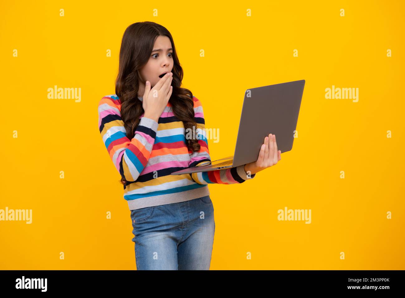 Young student school girl, studying with laptop computer. E-learning ...