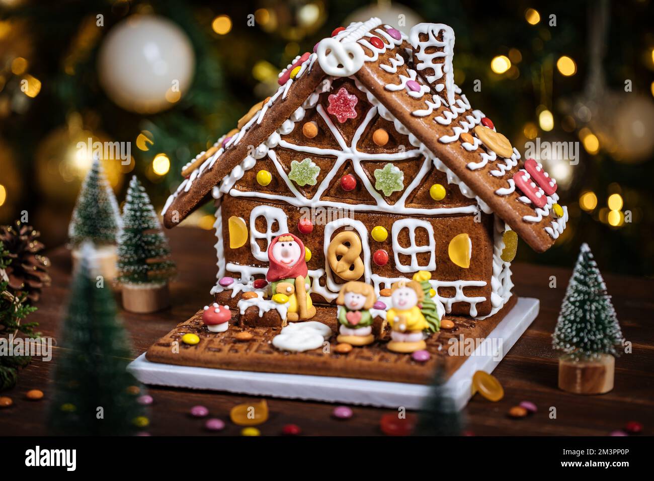 Christmas house made from gingerbread. Playfully decorated with ...