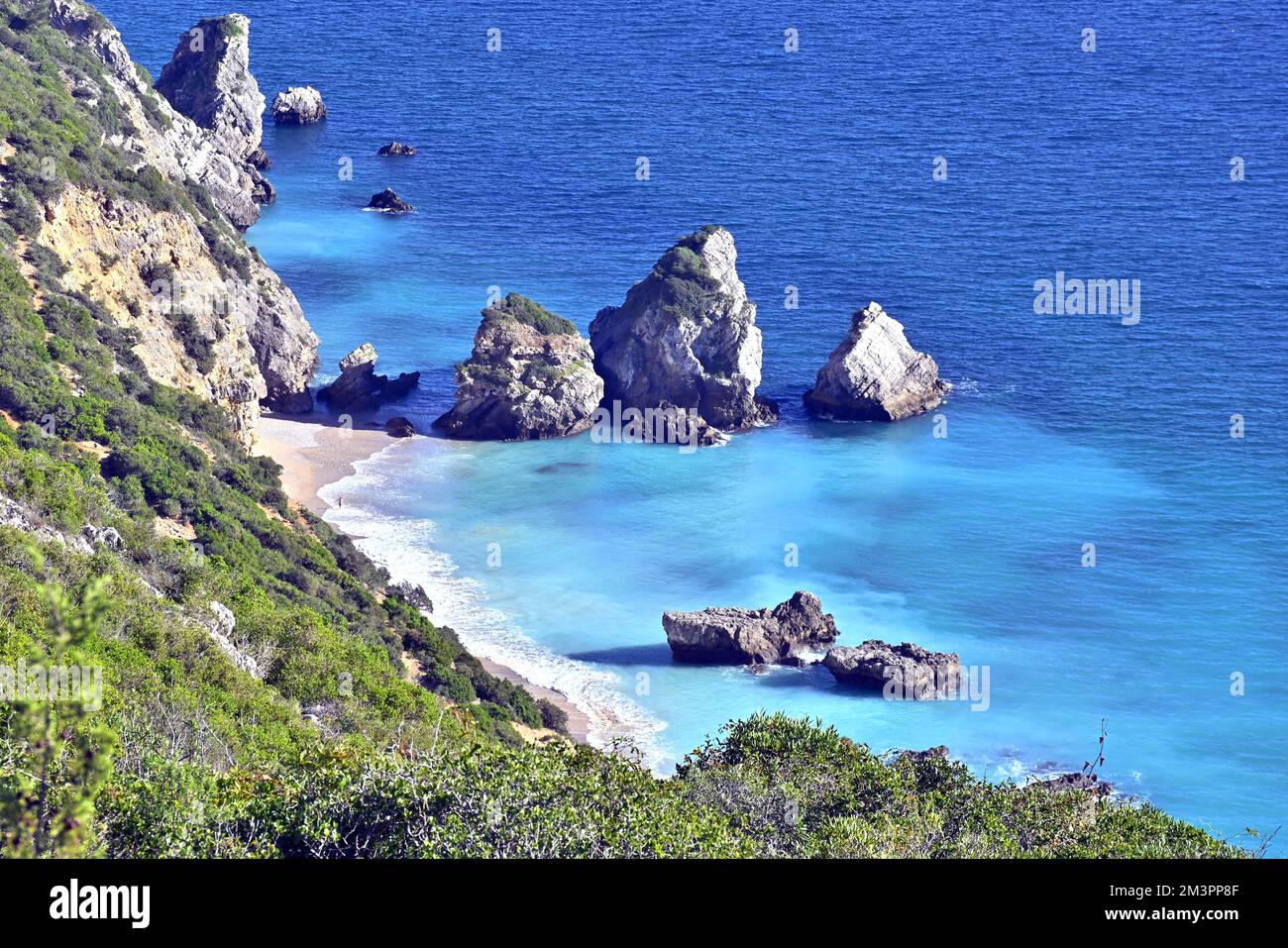 A beautiful view of Ribeiro do Cavalo Beach with rock formations in the ...