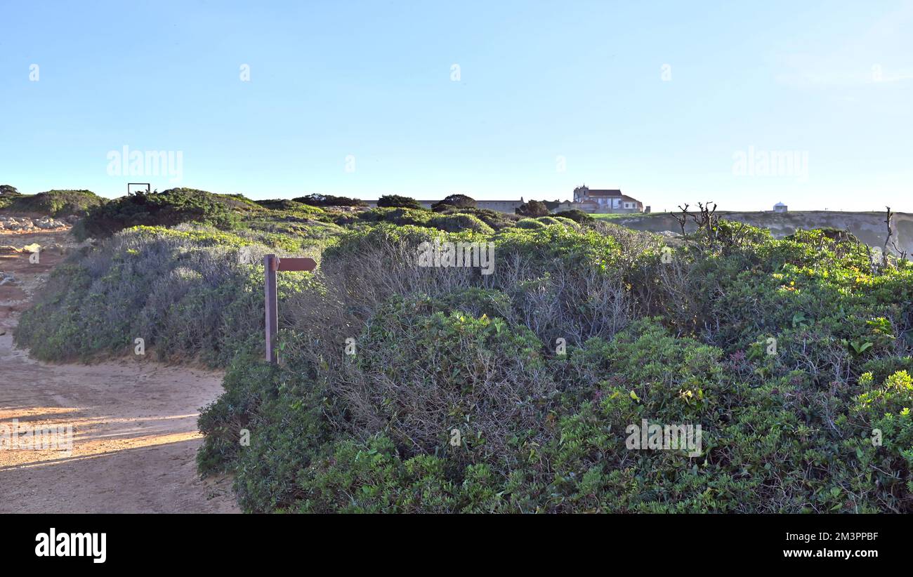 Dramatic cliffs at Cape Espichel on coast of Atlantic Ocean. The location is famous for the ...