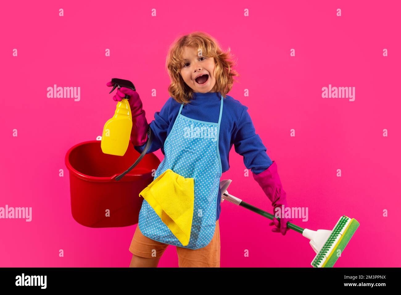 Kid cleans at home. Child cleaning with mop to help with housework ...