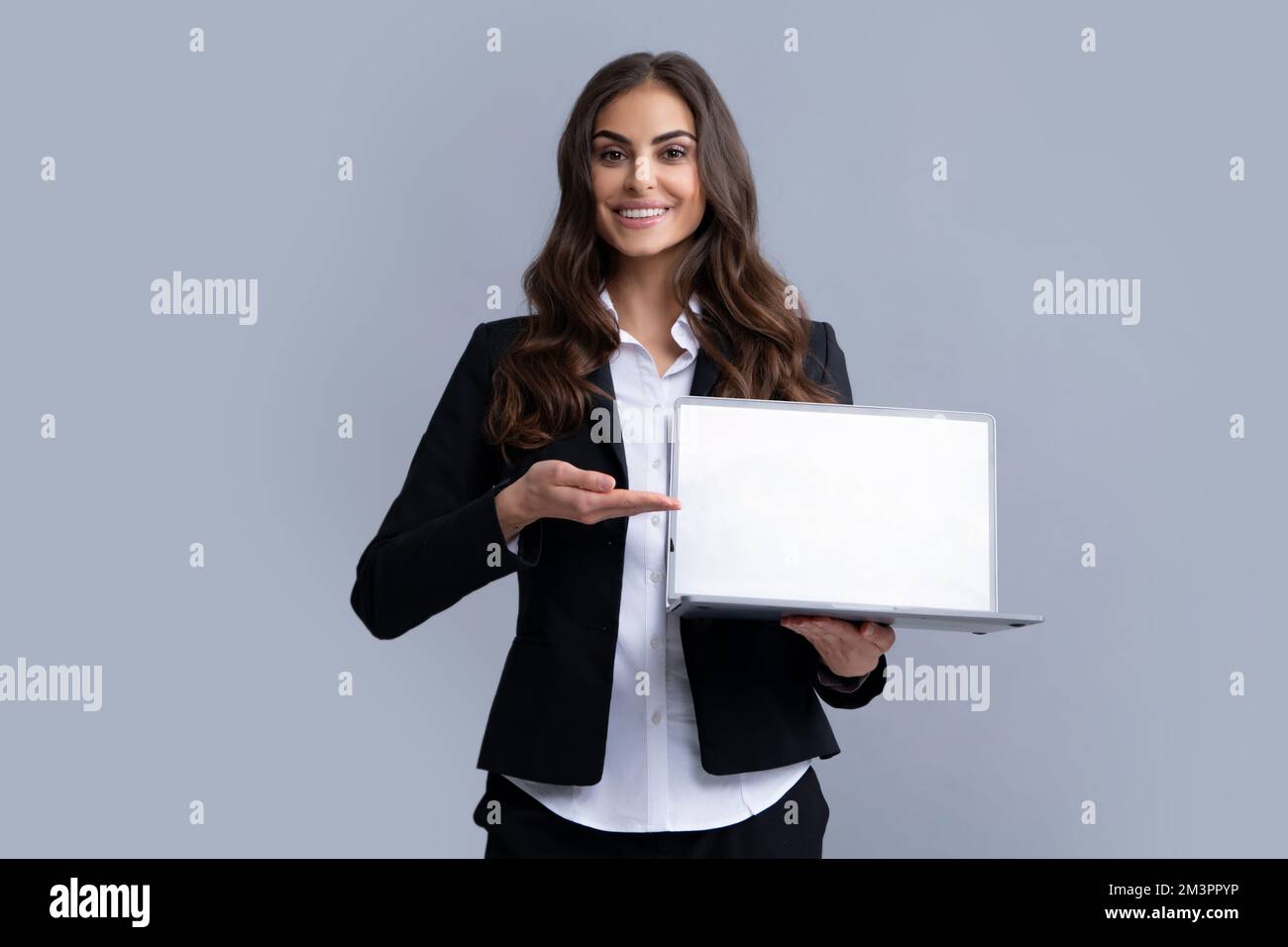 Portrait of positive cheerful ceo expert business woman work at laptop ...