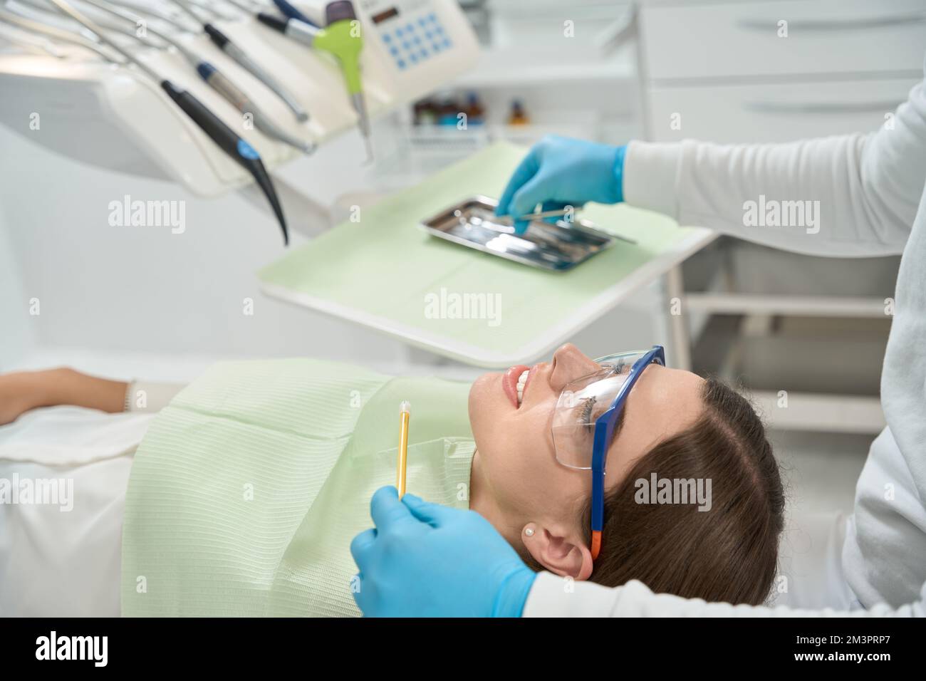 Young female patient waiting for dental check-up Stock Photo - Alamy