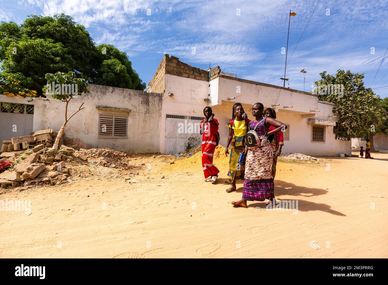MBOUR, SENEGAL - JANUARY Circa, 2021. Unidentified school aged girls ...