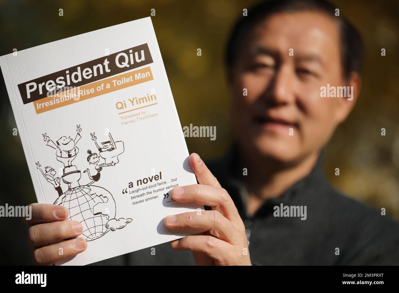 Man on toilet with a book hi-res stock photography and images - Alamy