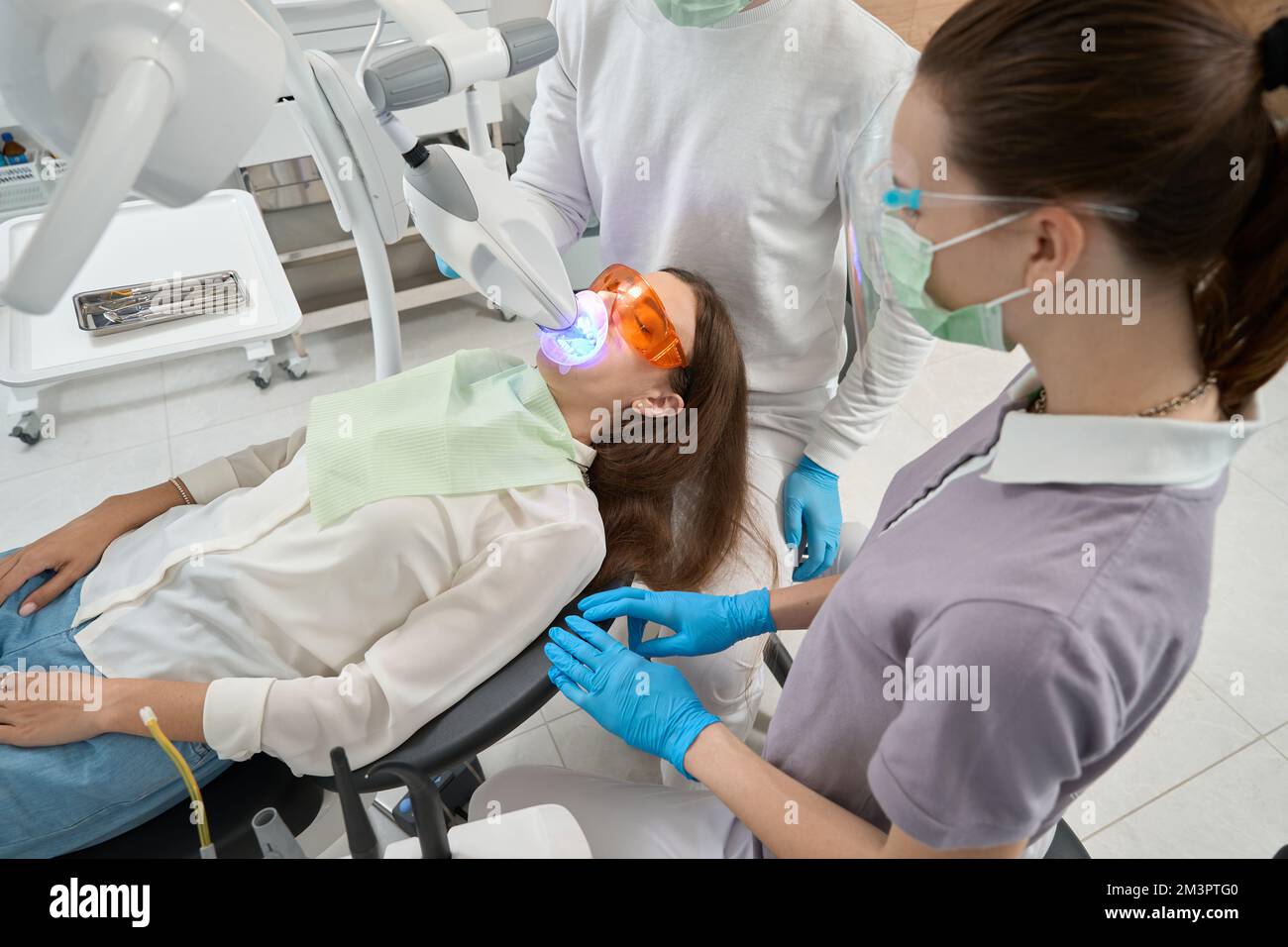 Dentist procedure client hi-res stock photography and images - Alamy