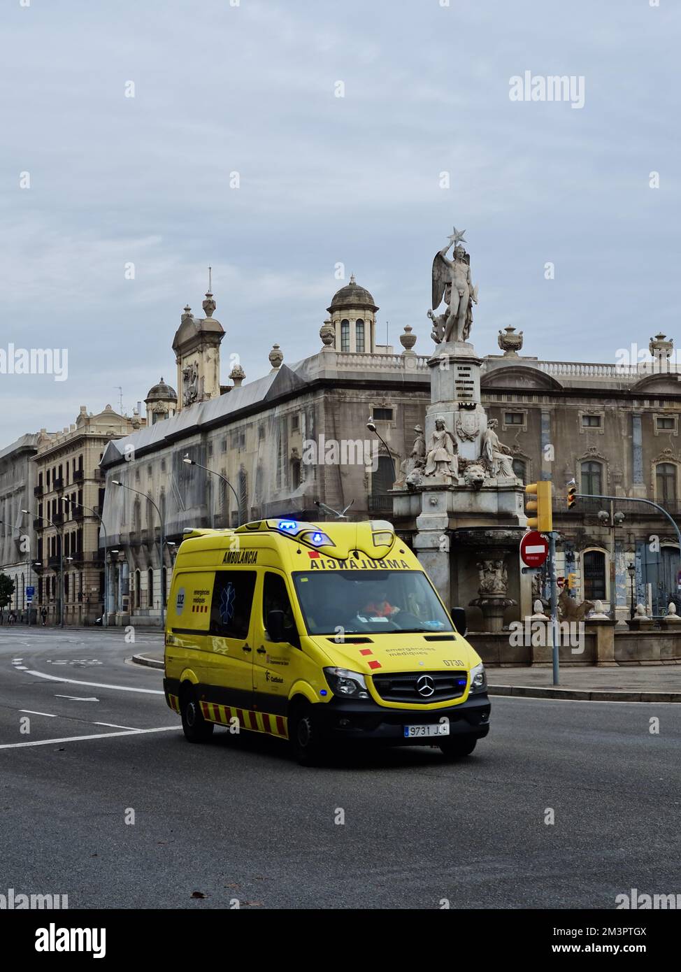 Ambulance driving with active sirens. Pla de Palau, Barcelona ...