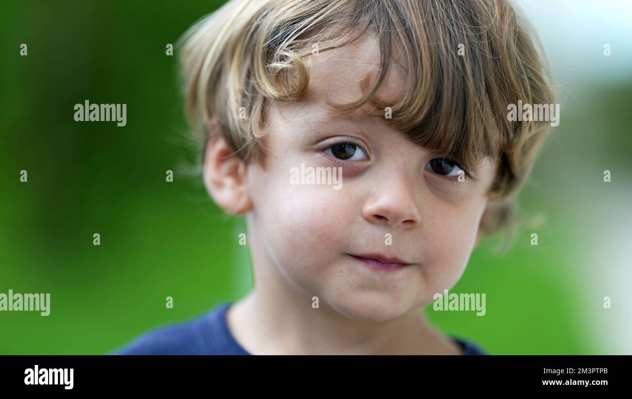 Adorable child portrait smiling at camera little boy face closeup ...