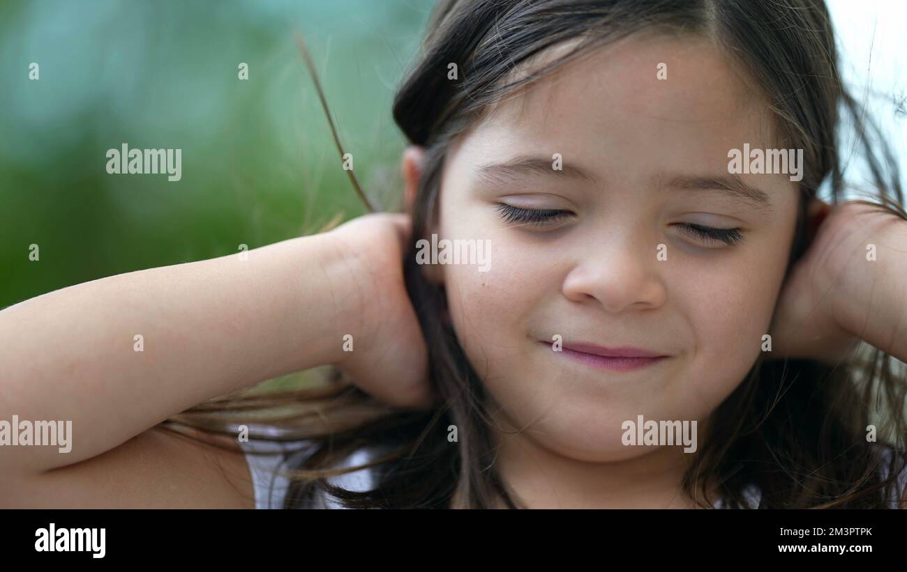 Adorable small girl portrait face smiling female child Stock Photo - Alamy