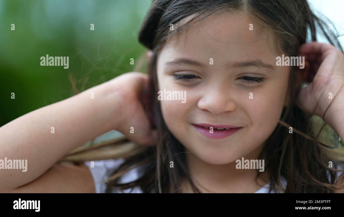 Adorable small girl portrait face smiling female child Stock Photo - Alamy