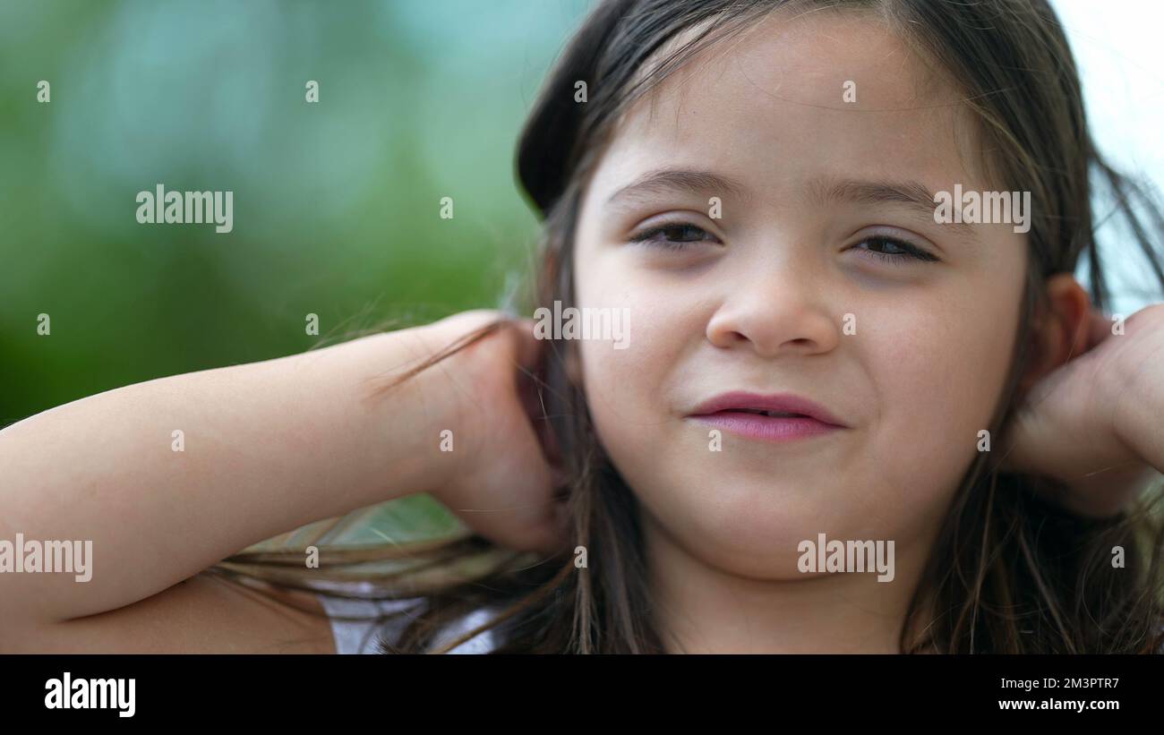 Adorable small girl portrait face smiling female child Stock Photo - Alamy