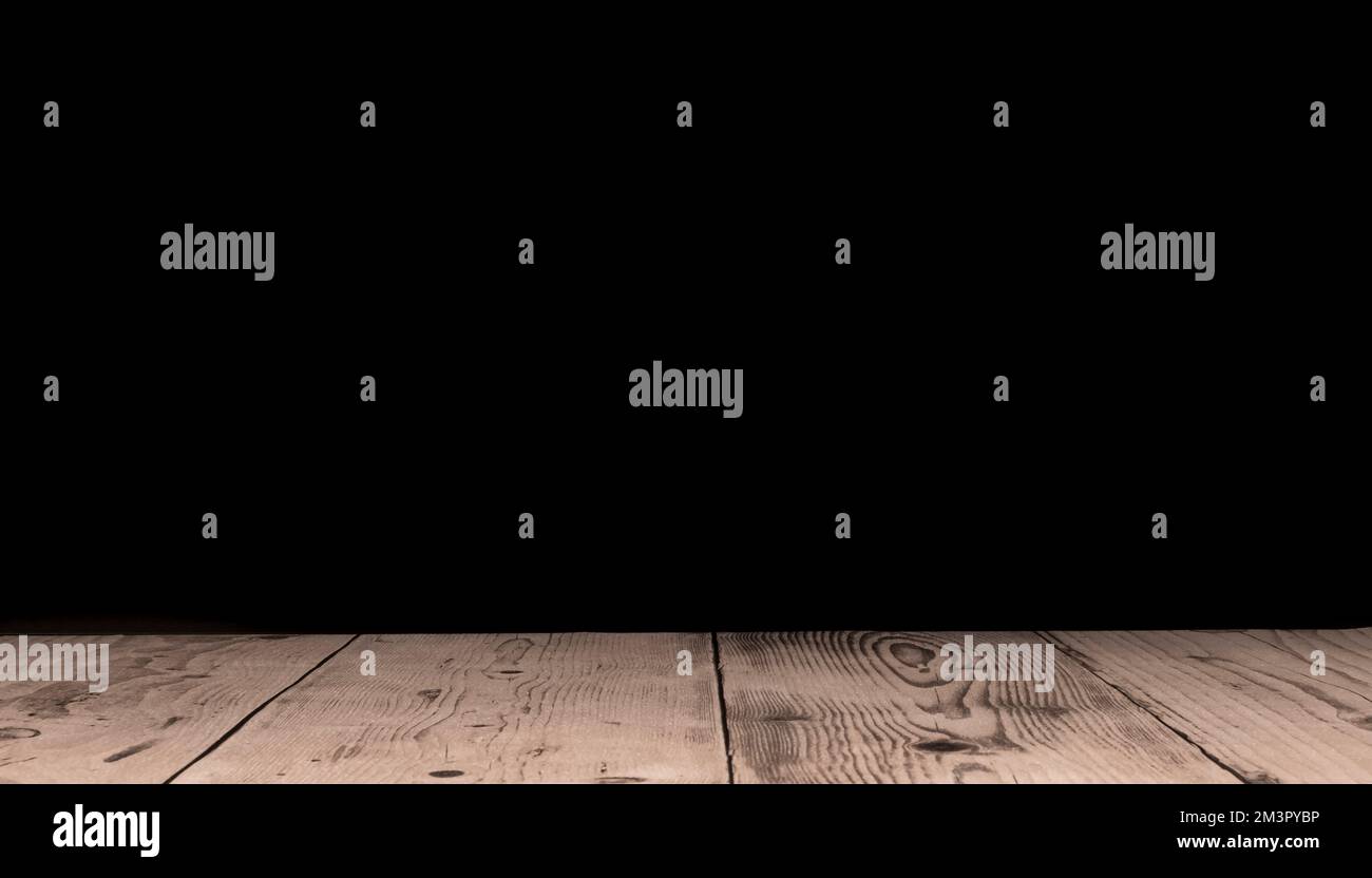 Black background with wood support for displaying advertising objects ...