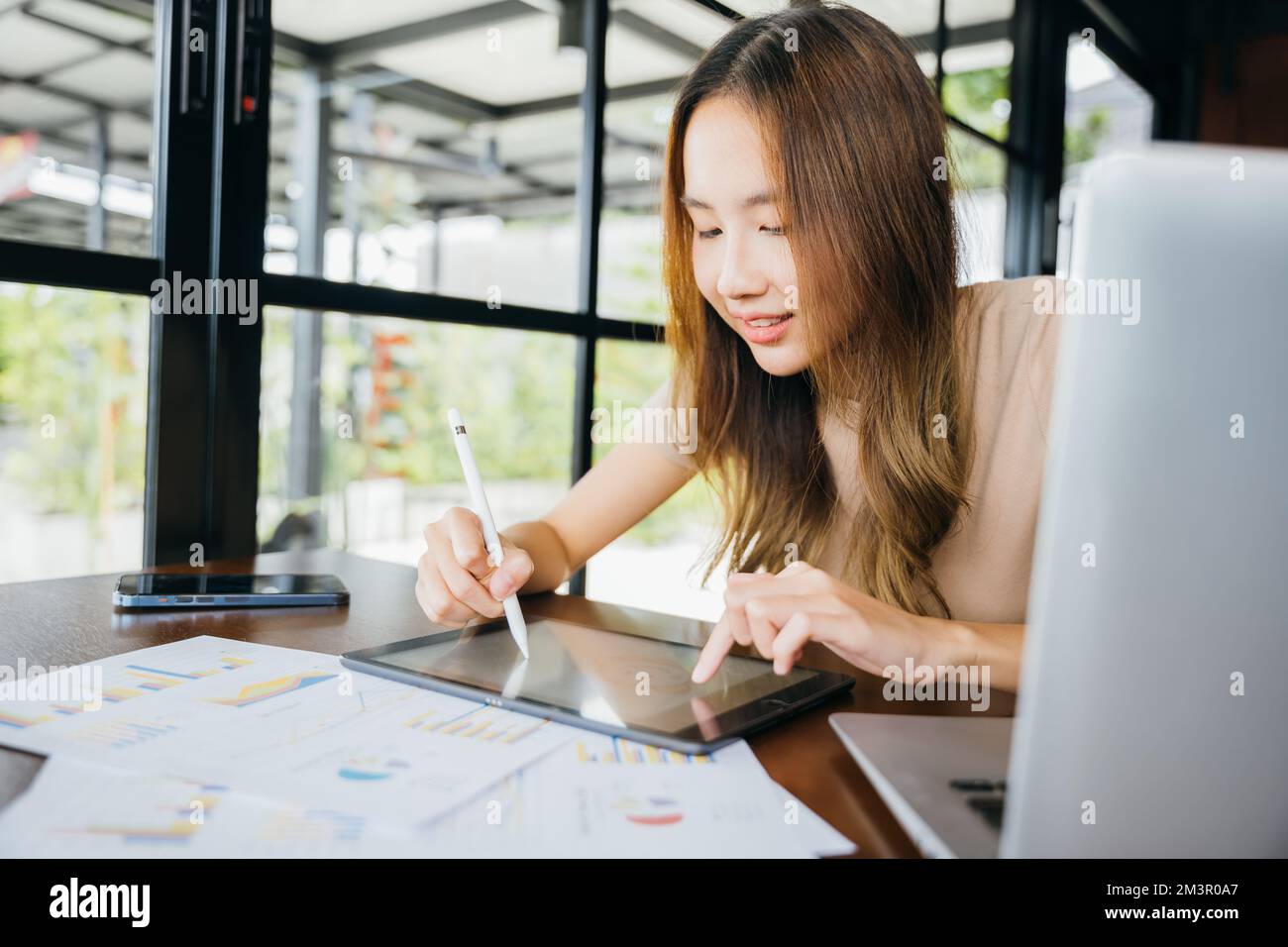 Smiling freelance artistic draw on screen Stock Photo - Alamy