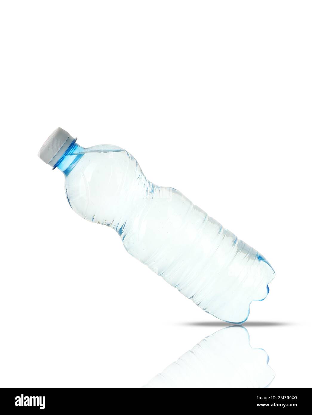 small tilted plastic bottle with water on a white background Stock ...