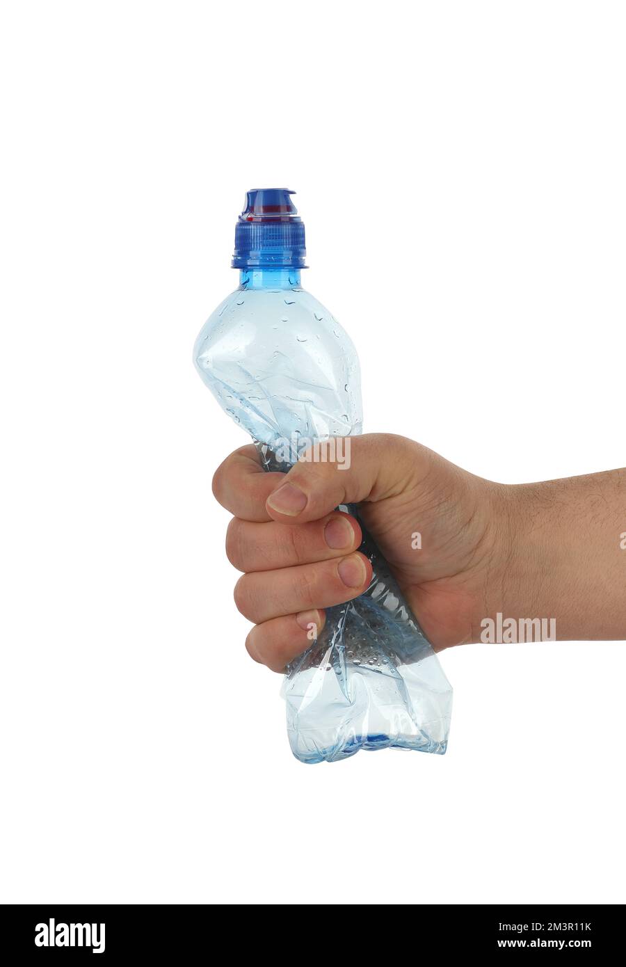 plastic bottle squeezed in a hand on a white background Stock Photo - Alamy