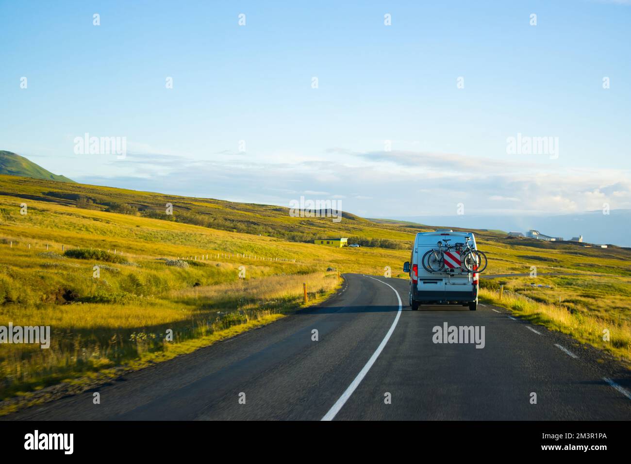 Family vacation cycle on a bus , road trip in a highway, green peaceful ...