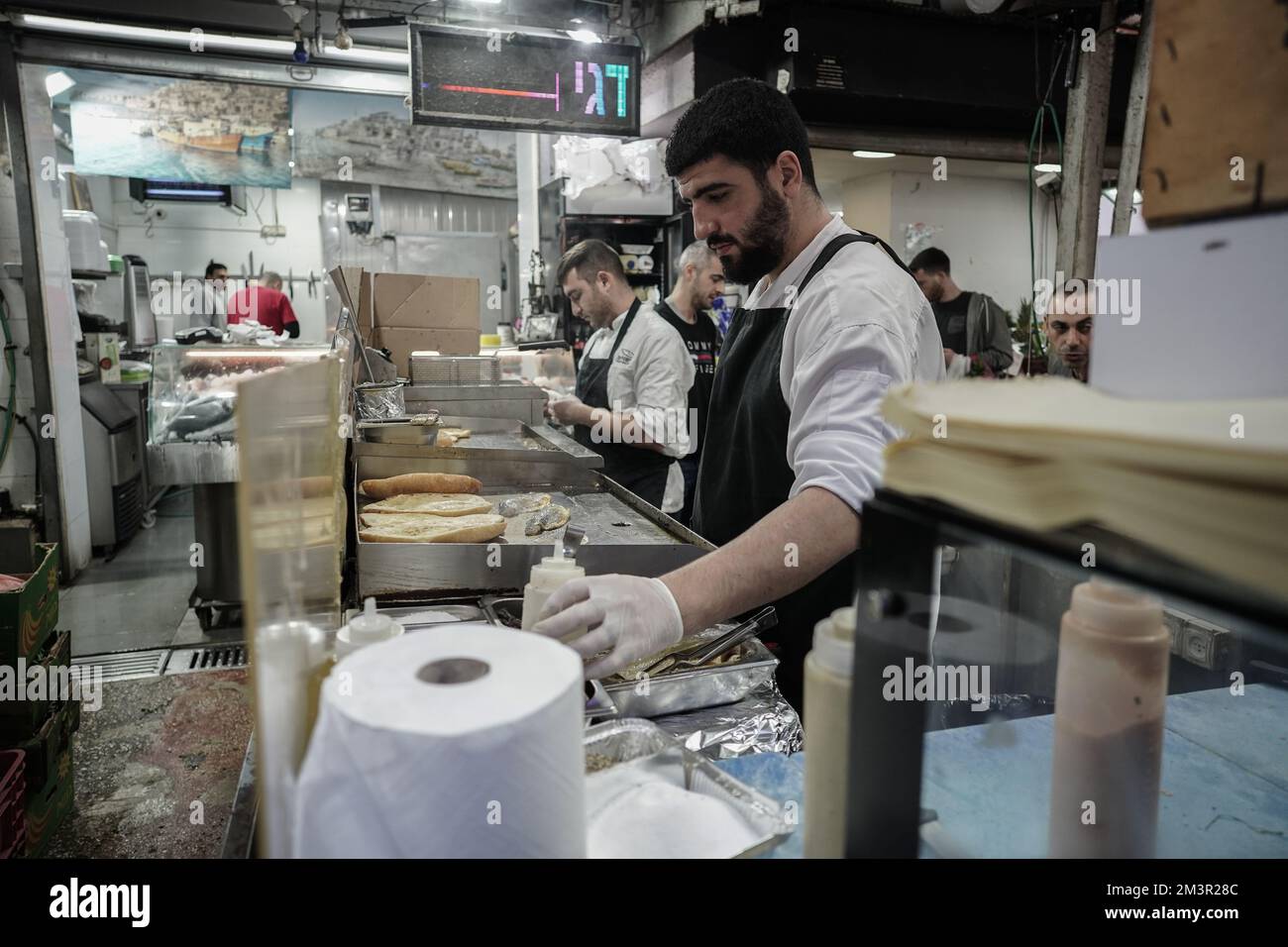 Tel Aviv, Israel. 16th December, 2022. A shop selling fresh fish opens ...