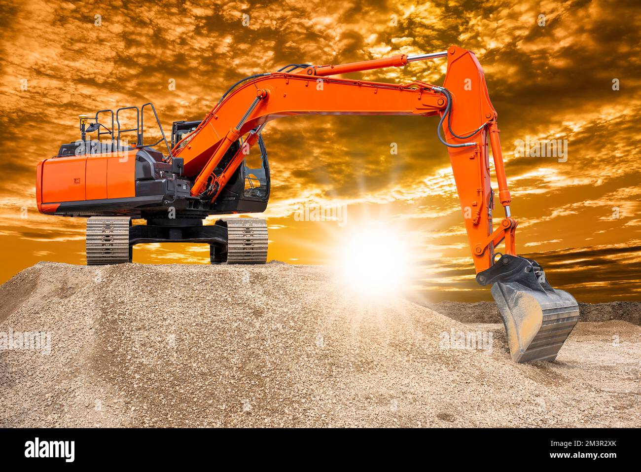 excavator ist working and digging at construction site Stock Photo - Alamy