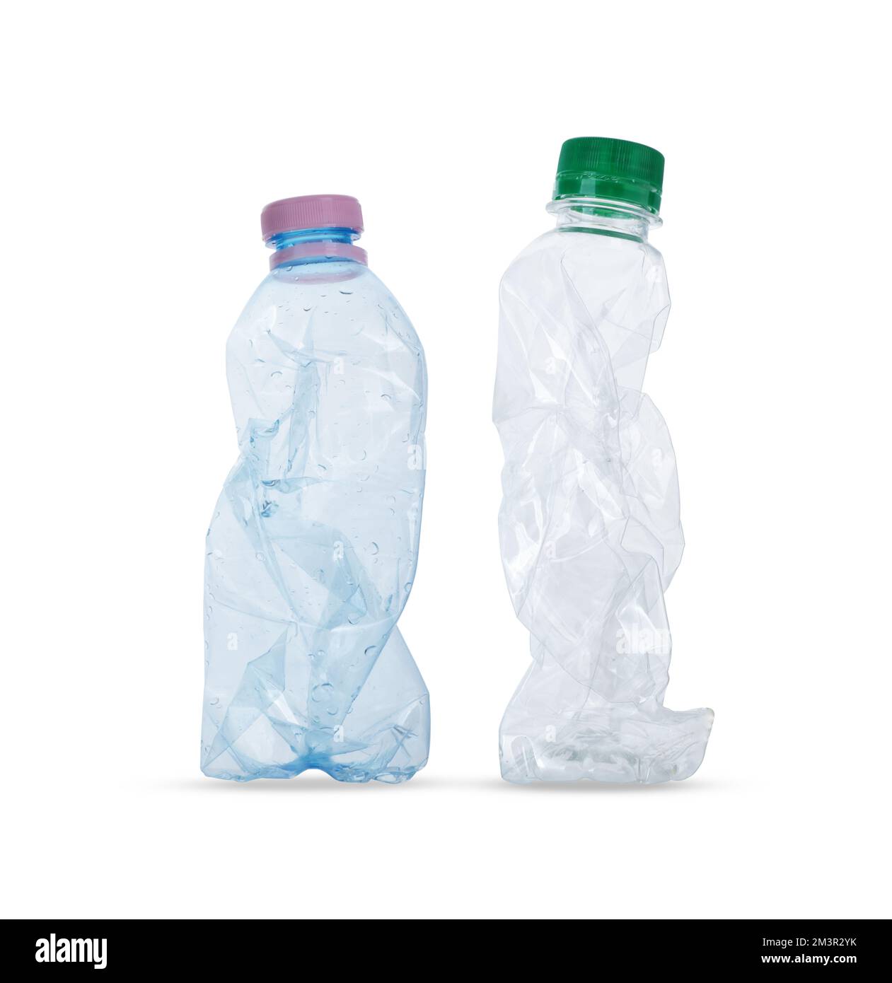 two crushed plastic water bottles isolated on white background Stock Photo - Alamy