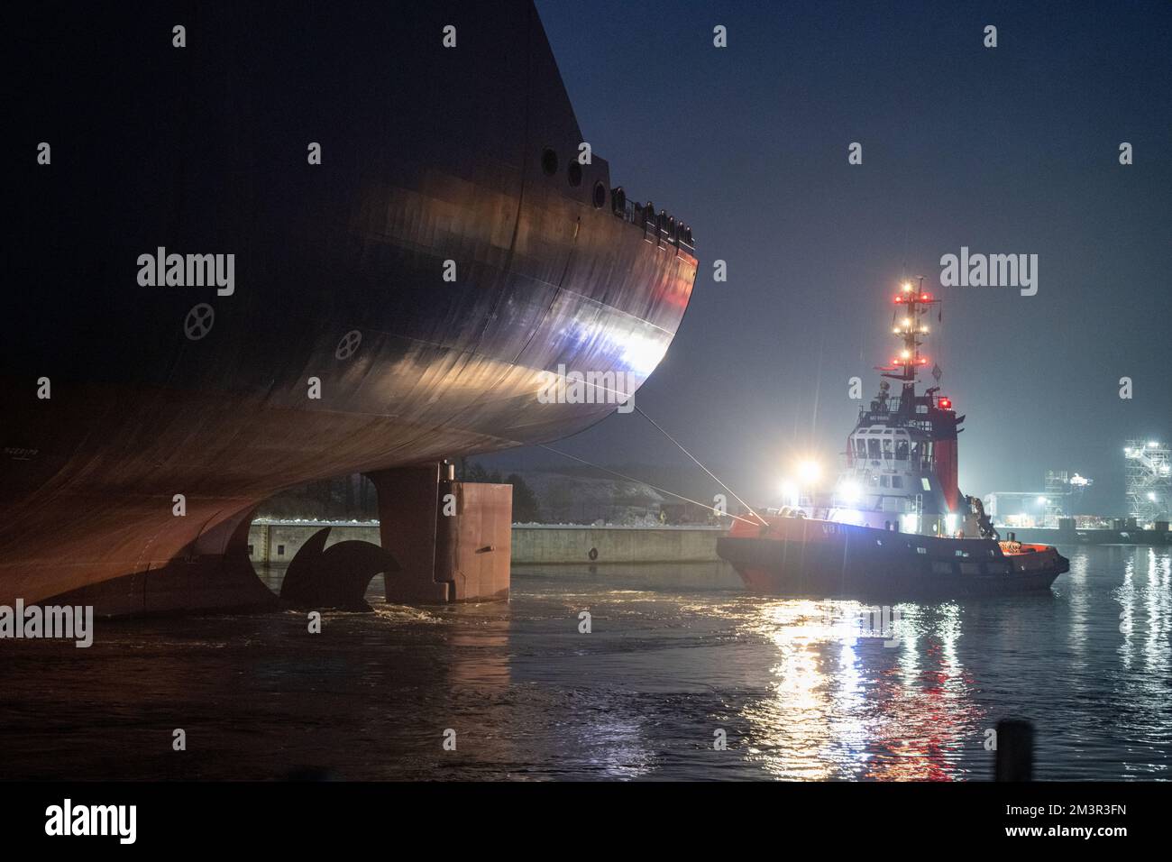 Lubmin, Germany. 16th Dec, 2022. The "Neptune" is towed by tugs into ...