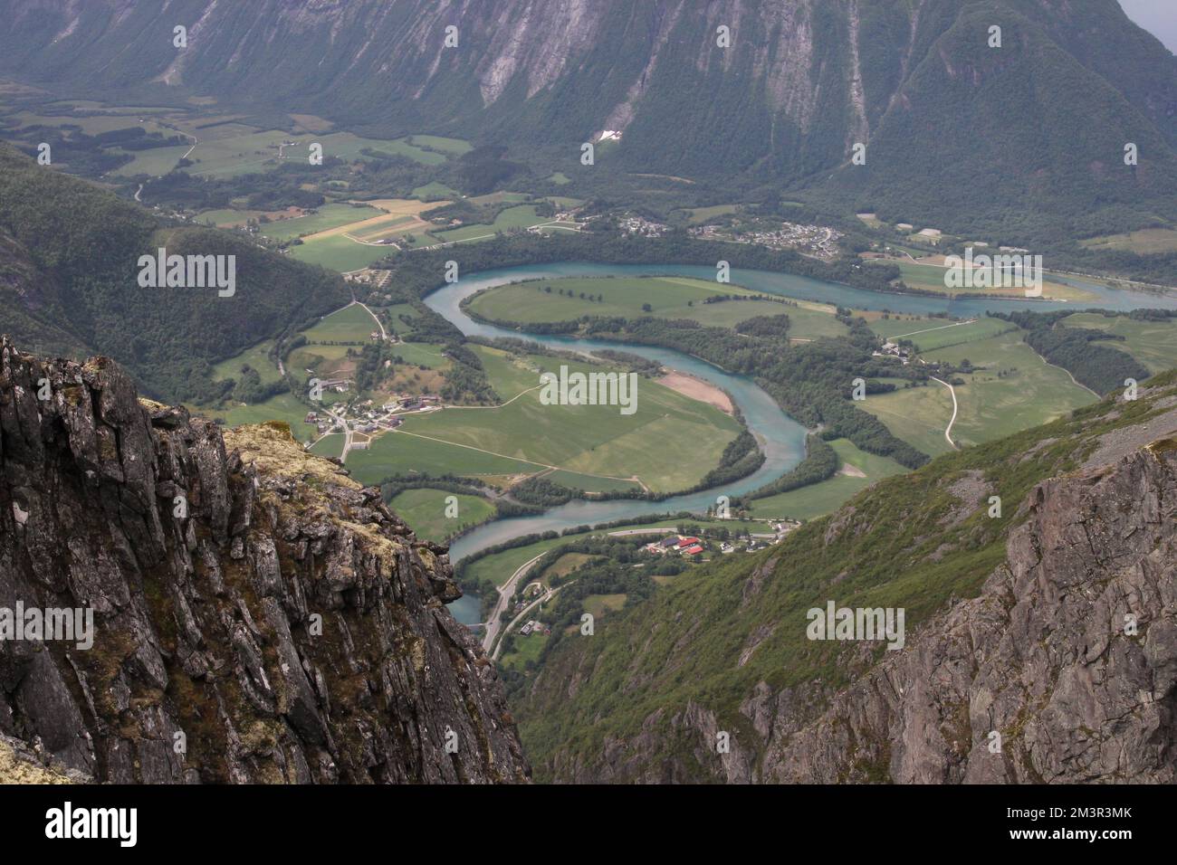 A high-angle shot of the winding river in Rauma Norway surrounded by ...