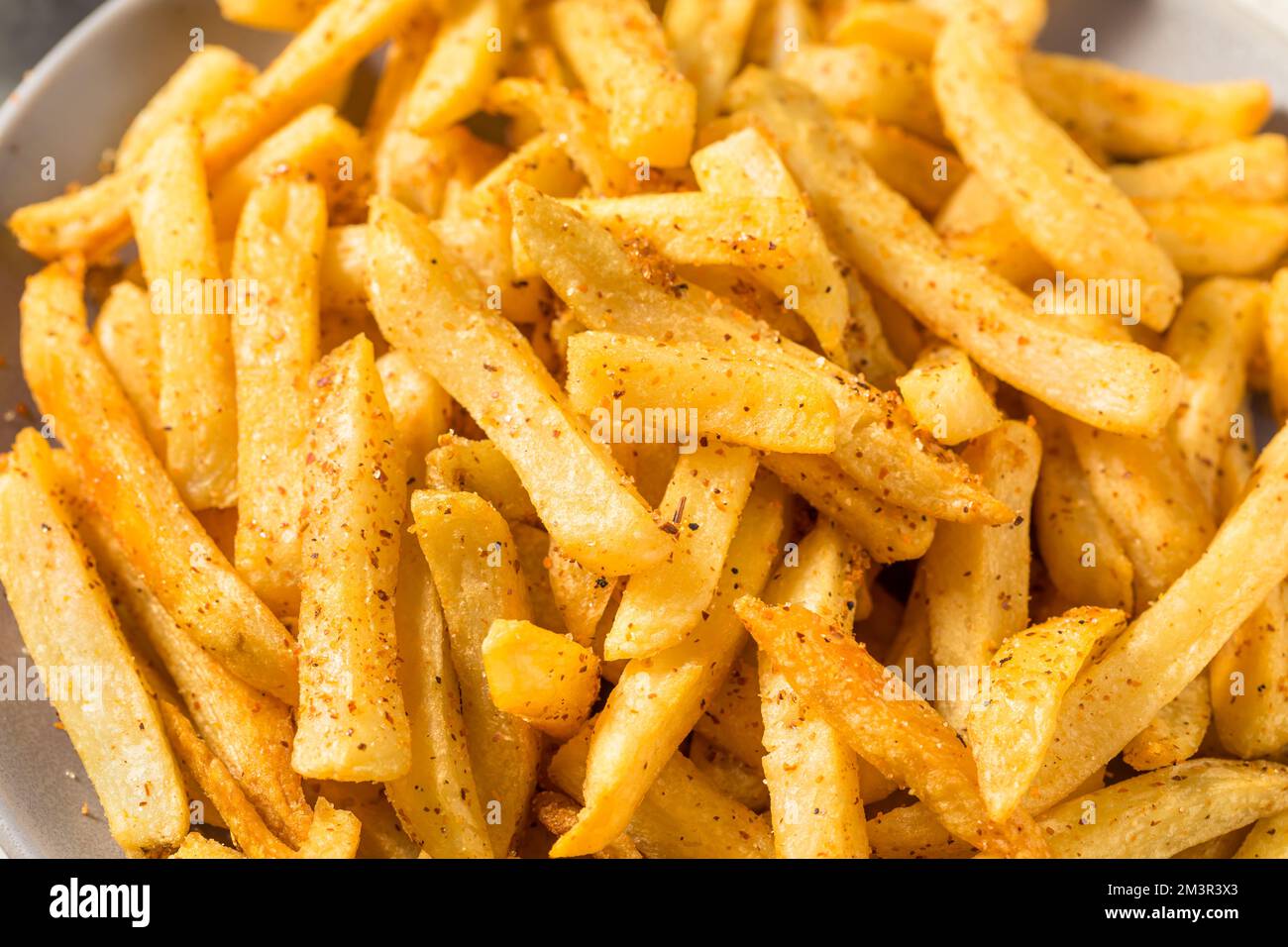 Homemade Spicy Cajun French Fries with Mayo Stock Photo - Alamy
