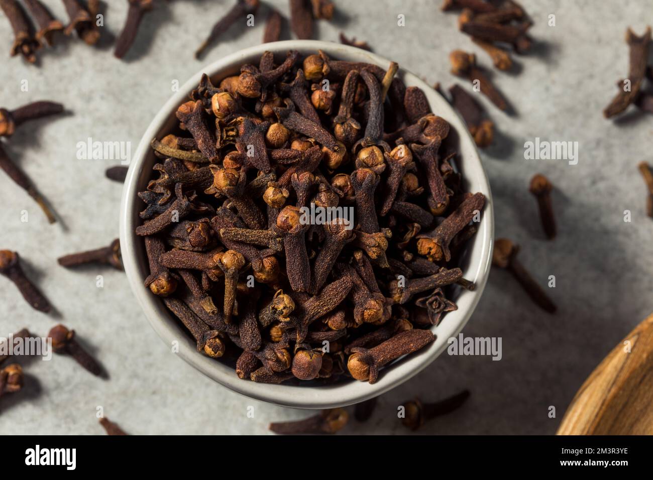Raw Brown Organic Whole Cloves in a Bowl Stock Photo - Alamy