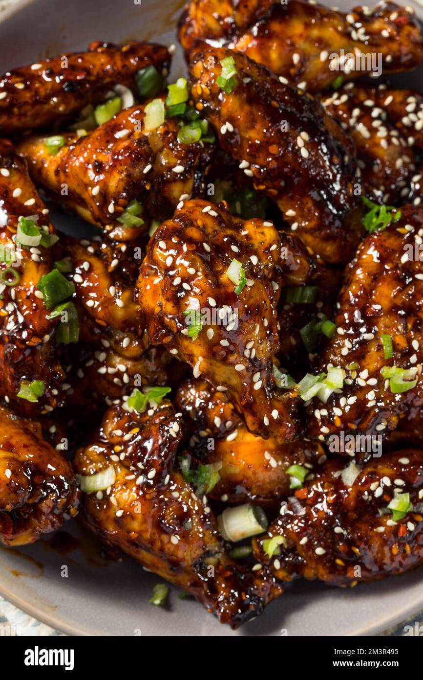 Homemade Asian Chili Crunch Chicken Wings with Sesame Seeds Stock Photo ...