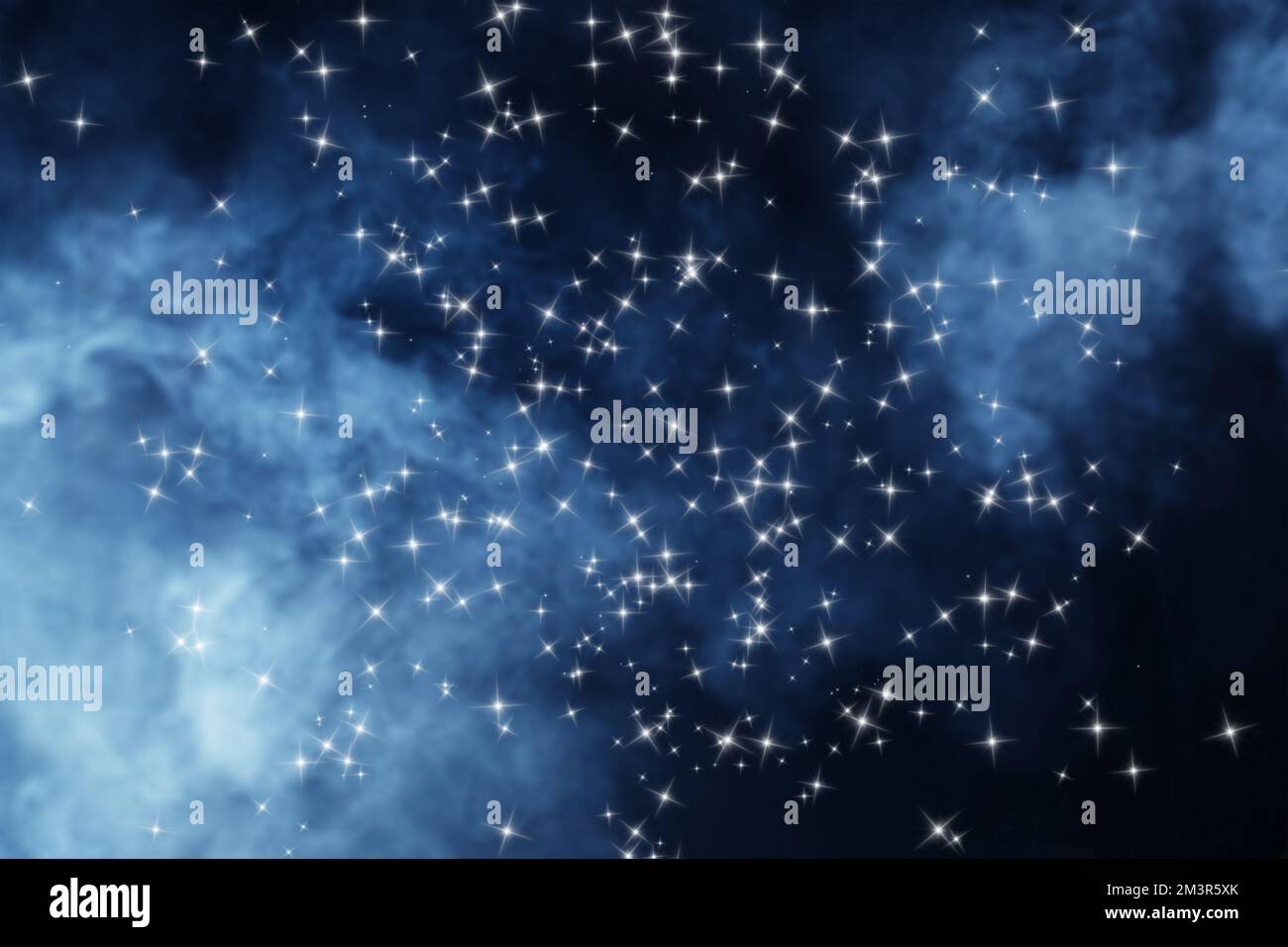 Many stars and nebulae on a blue background Stock Photo - Alamy