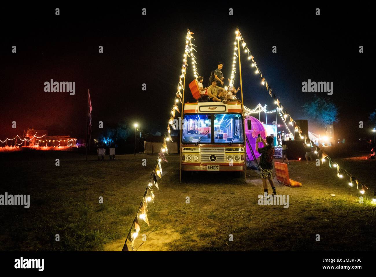 Pattaya, Thailand. December 17, 2022. Festivalgoers hang out at the ...