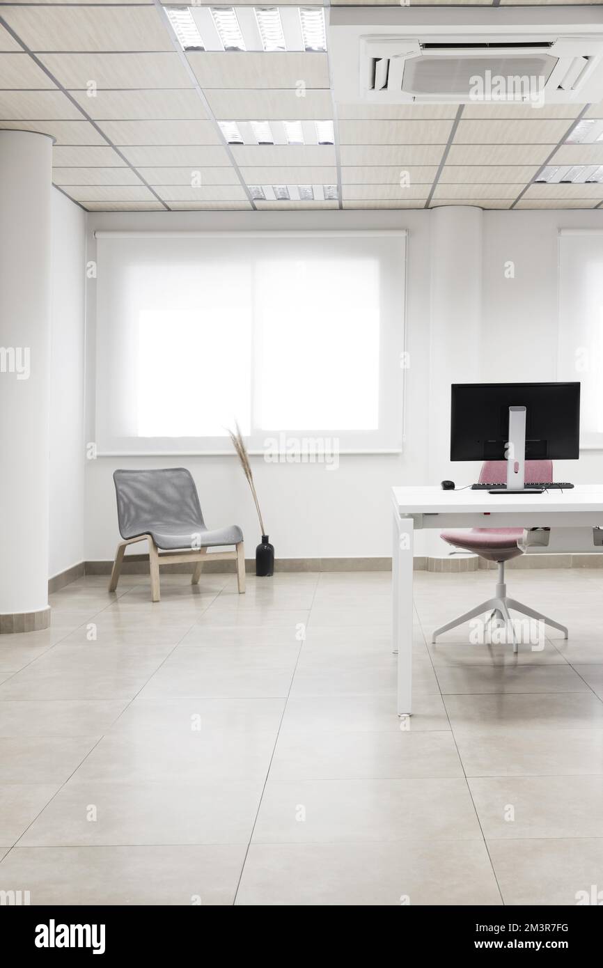 Chairs computer desktop arrangement Stock Photo - Alamy