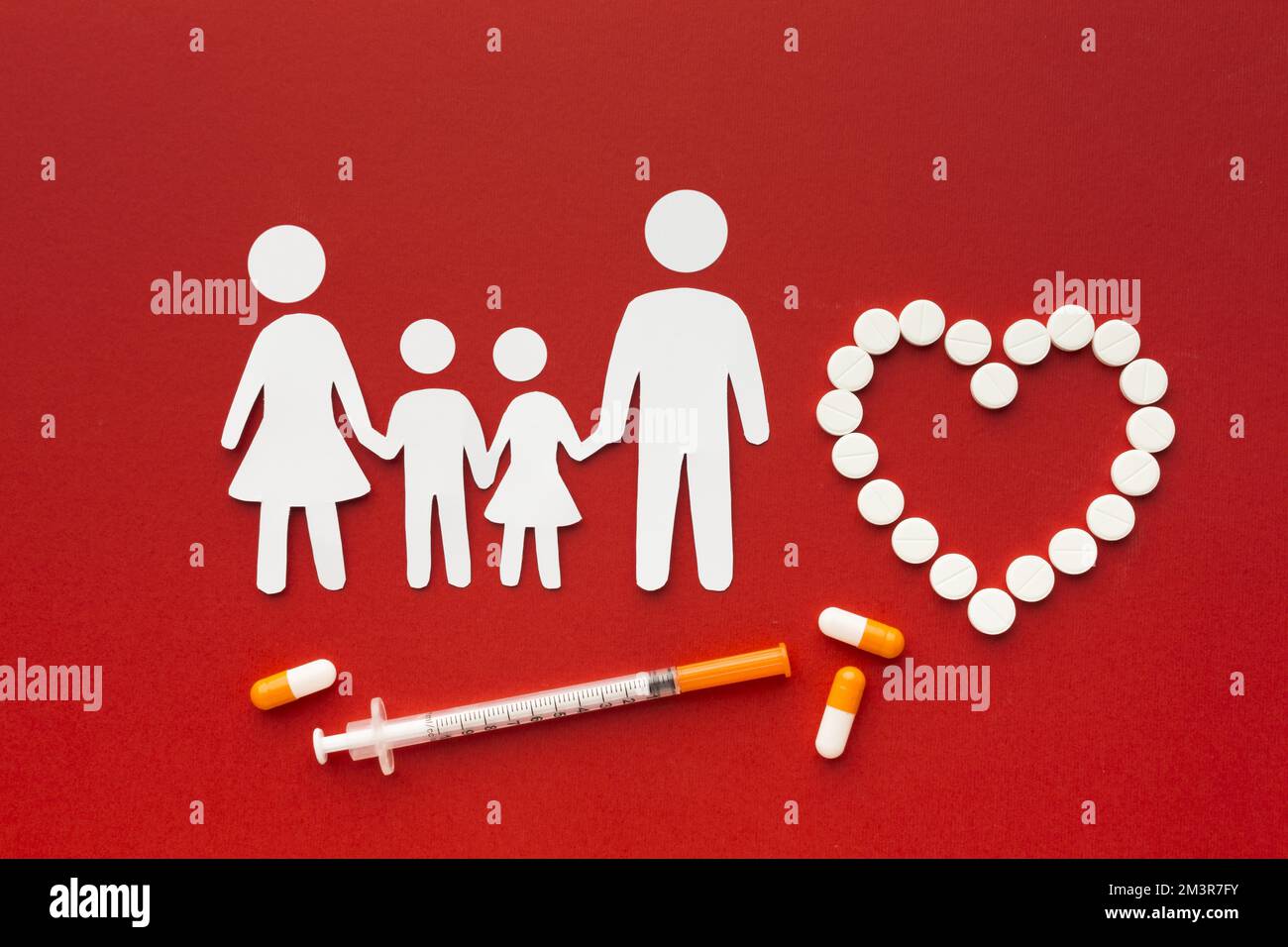 Cardboard family shapes with drugs syringe Stock Photo - Alamy